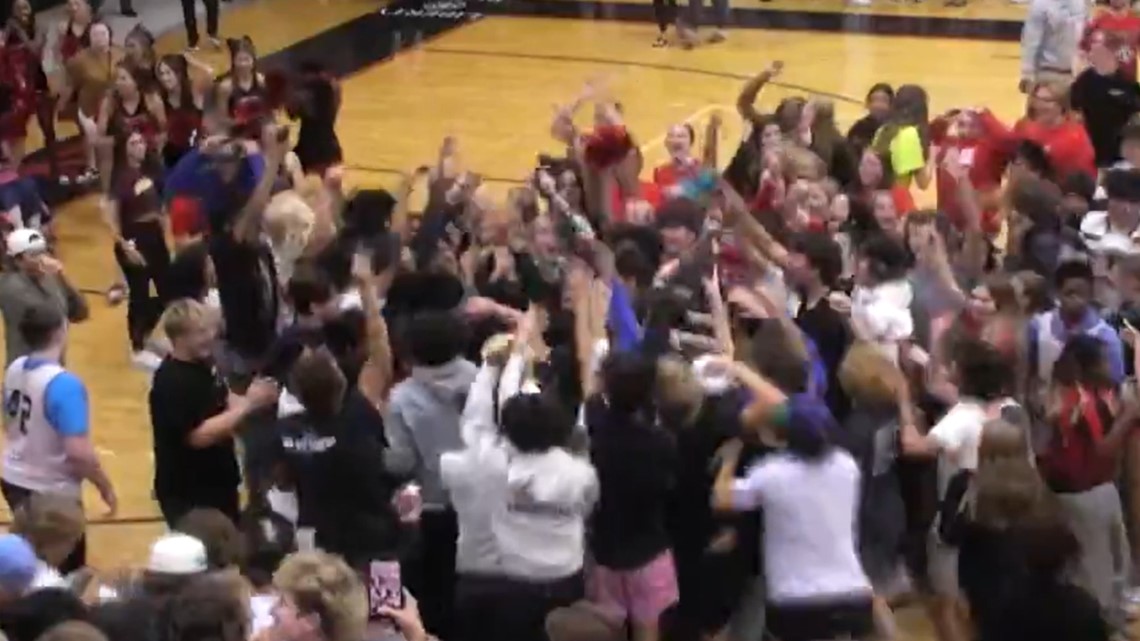 Liberty High School junior makes half court shot, crowd goes wild ...