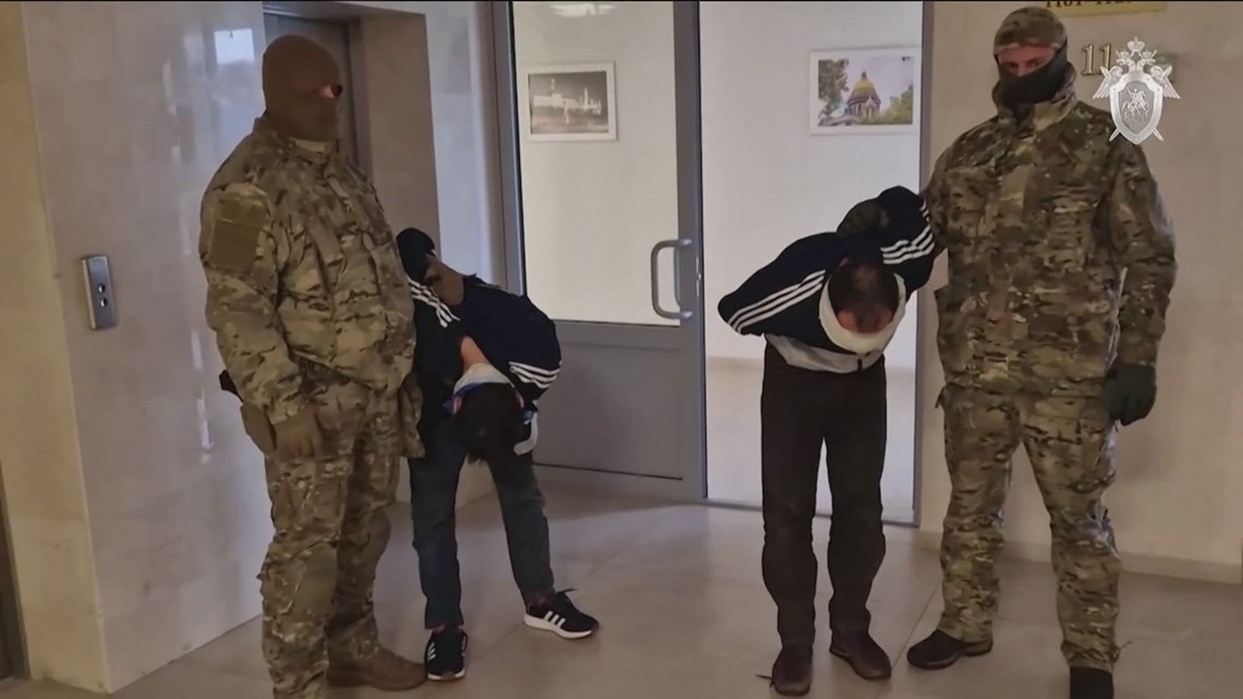 Suspects accused of concert hall shooting in Moscow appear in court ...