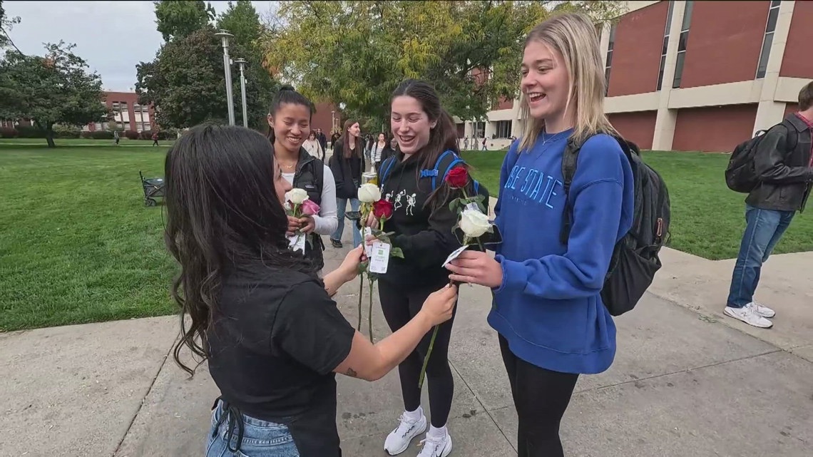 Initiative passes flowers out to BSU students to spread joy | ktvb.com