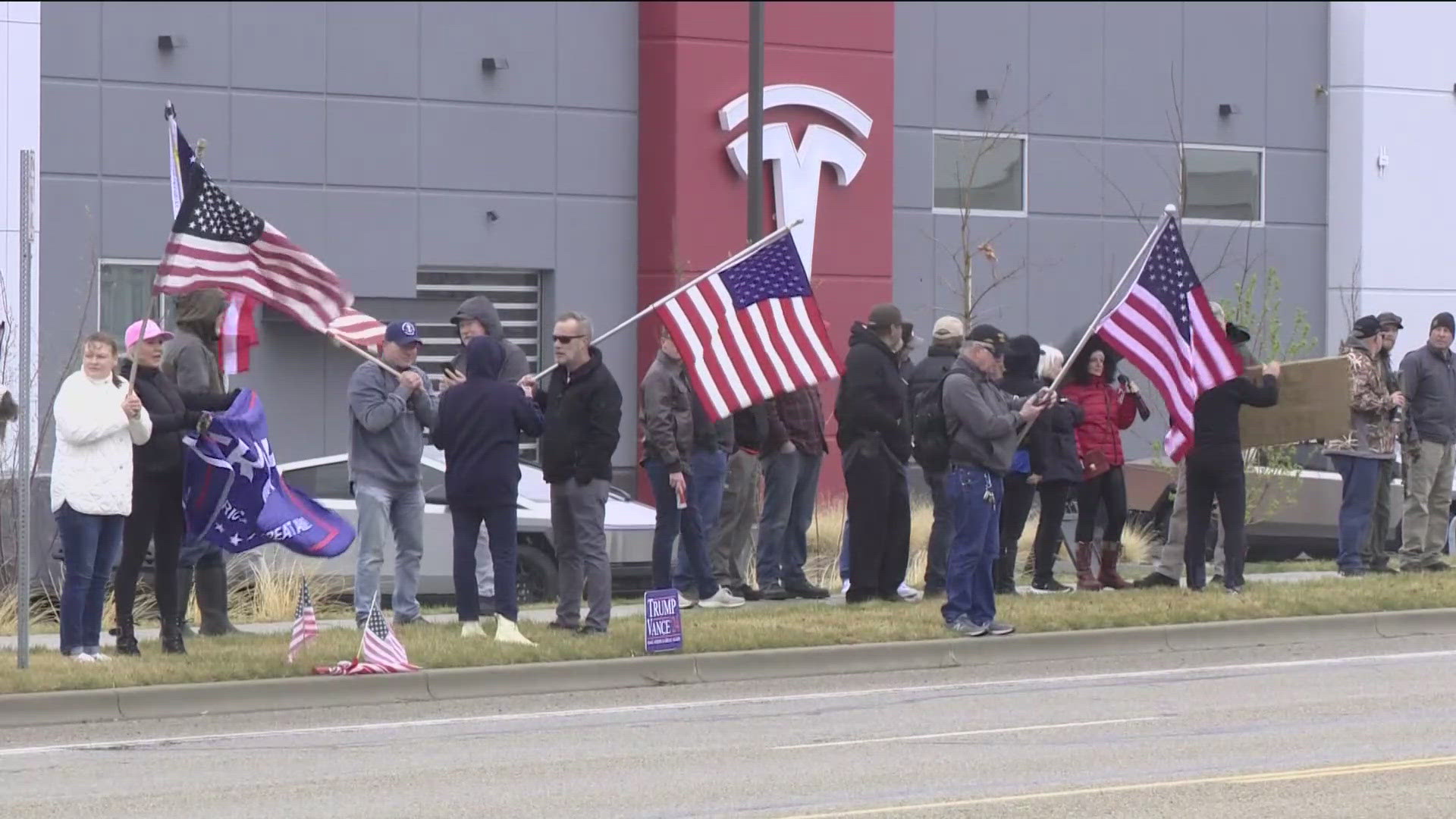 Opposing protest groups face off at Idaho Tesla dealership | ktvb.com